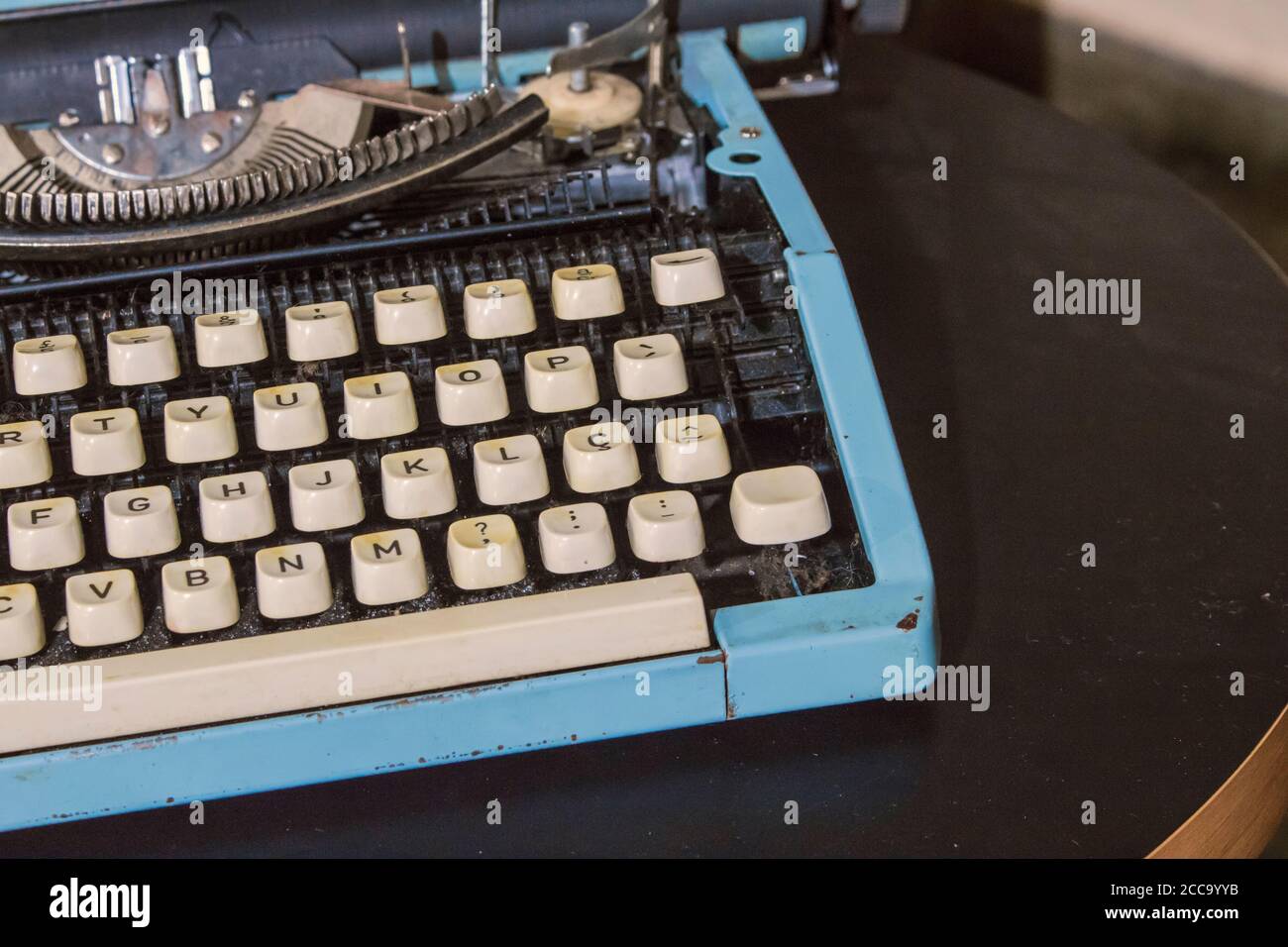 Old blue typewriter retro objects concept image Stock Photo - Alamy