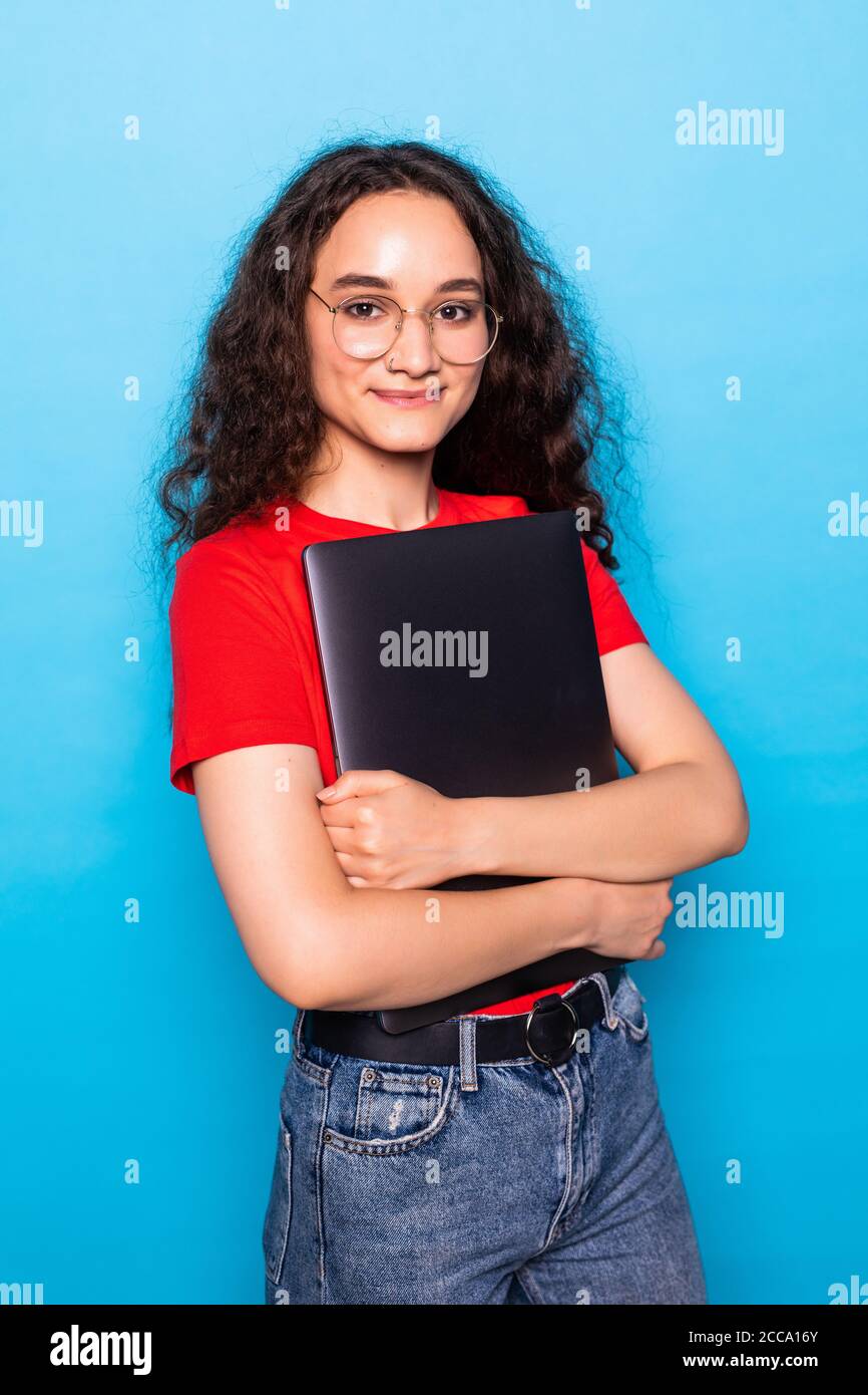 Smart Beautiful Young Girl Using Laptop Pc Computer Isolated On Blue