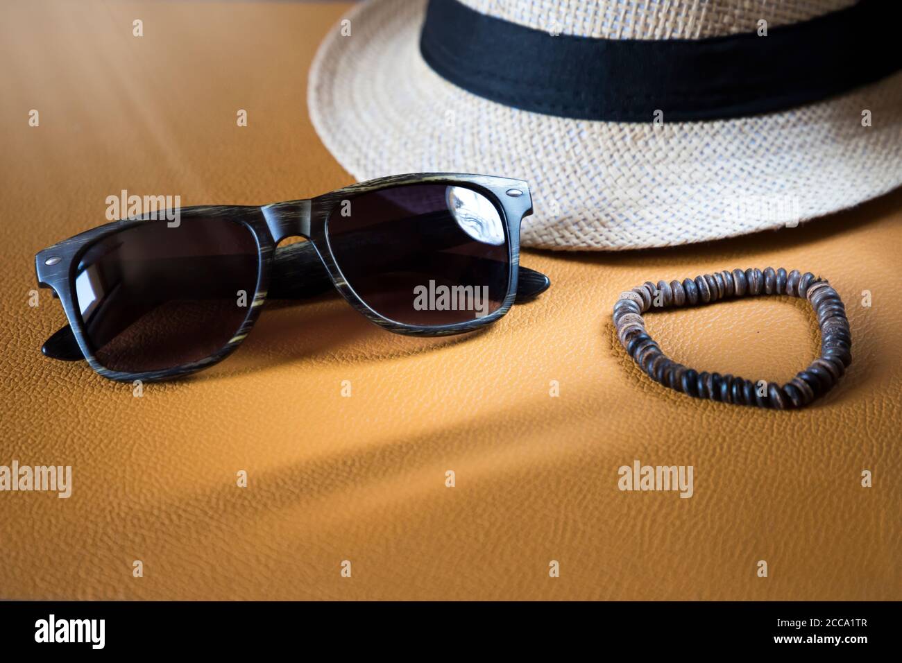Summer and holiday concept. Image with summer objects in an orange ...