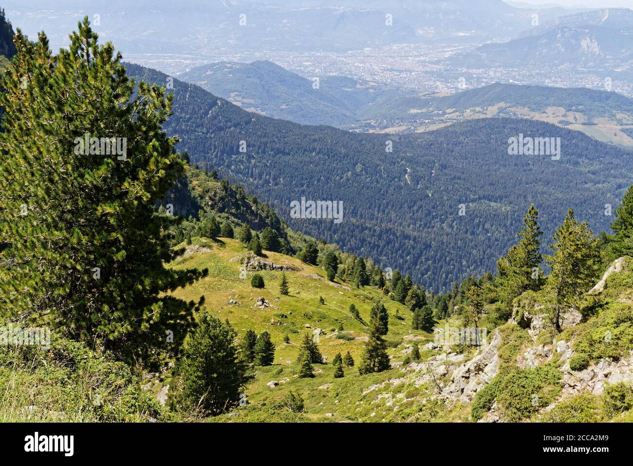 The city of Grenoble in the far background from a mountain path Stock ...