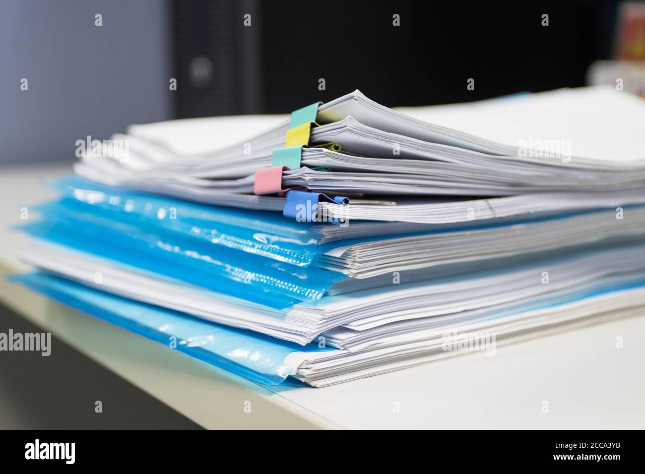 file folder and Stack of business report paper file on the table in a ...