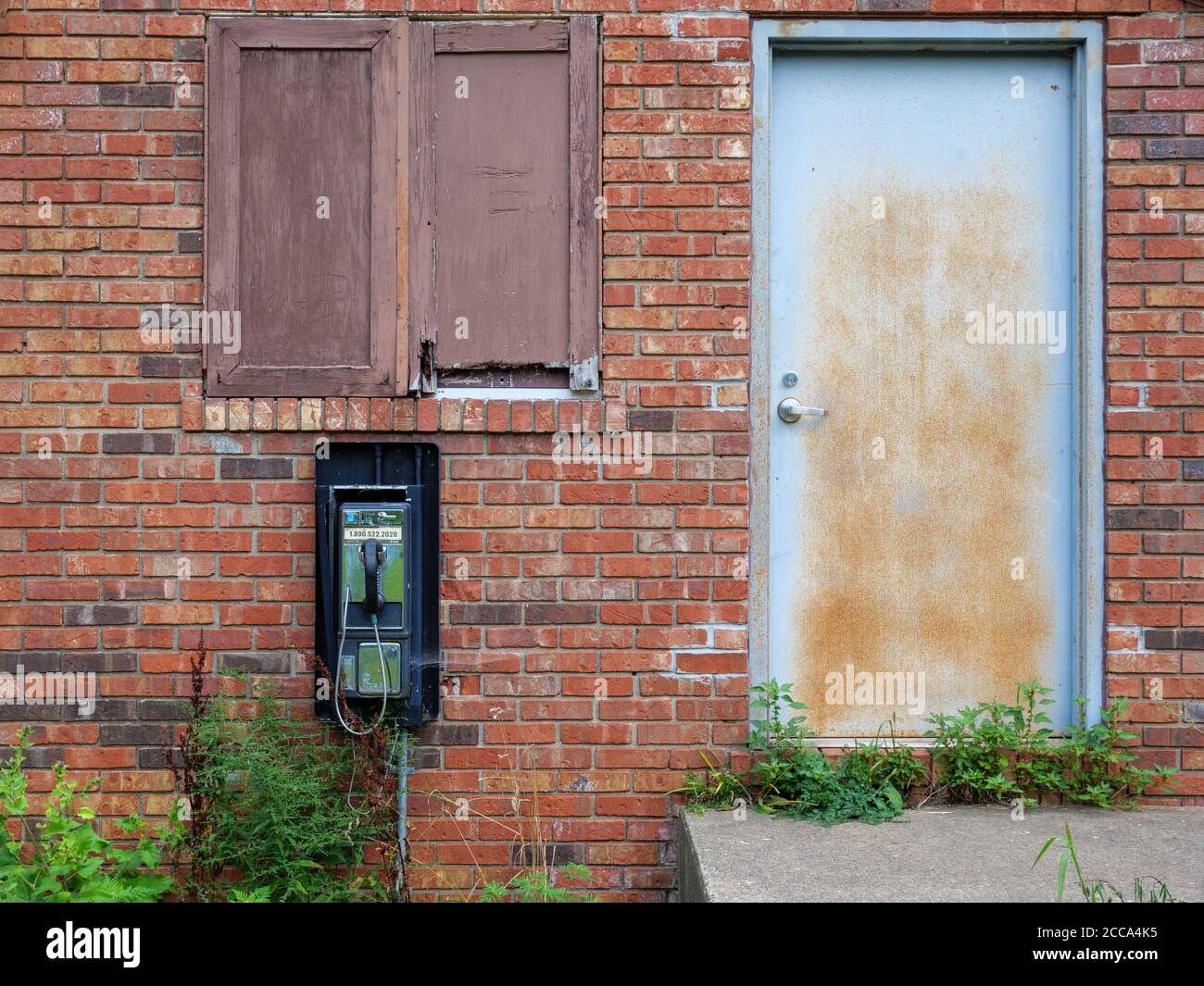 Wall mounted pay phone hi-res stock photography and images - Alamy