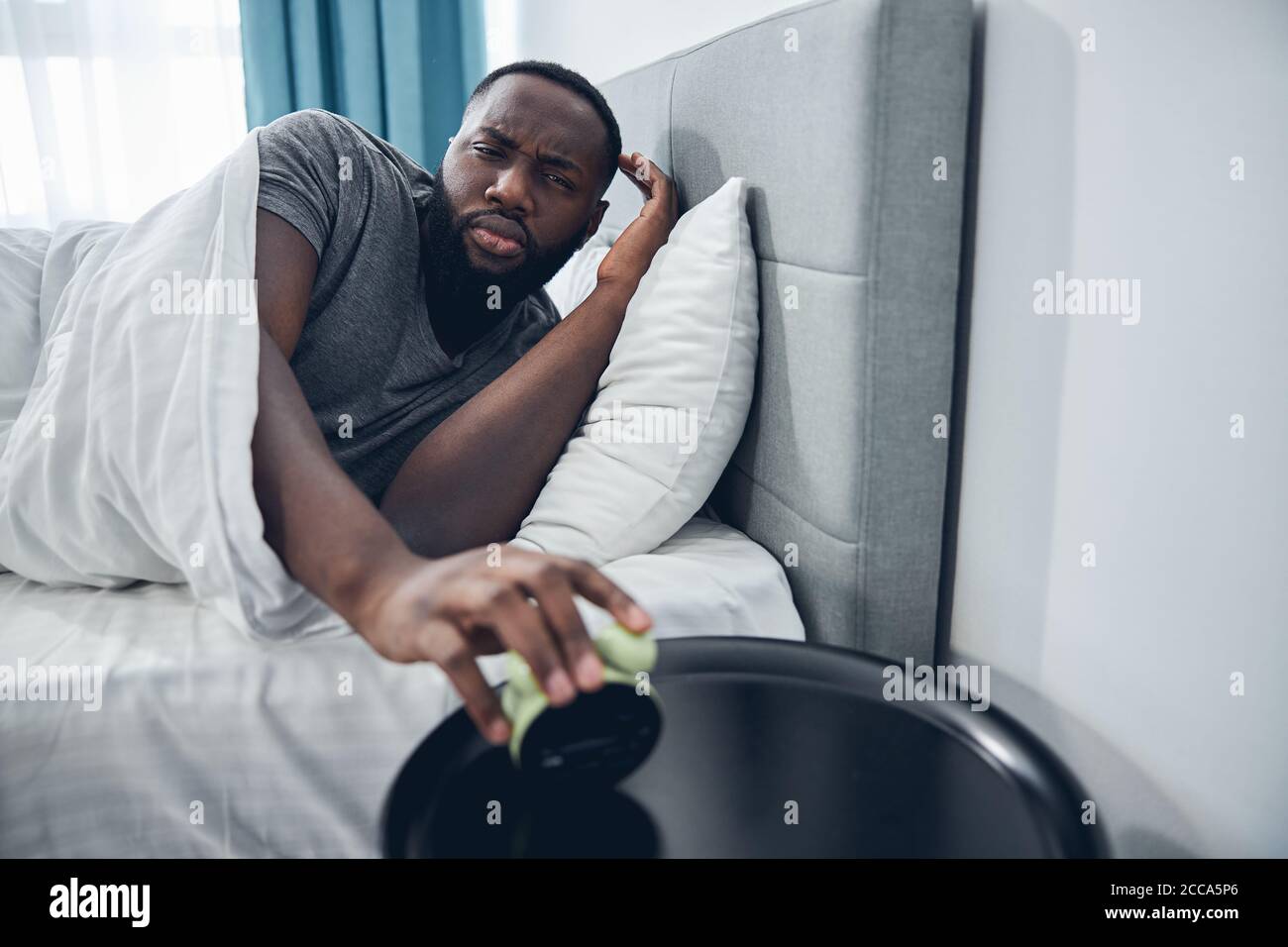 Serious bearded male person being deep in his thoughts Stock Photo - Alamy