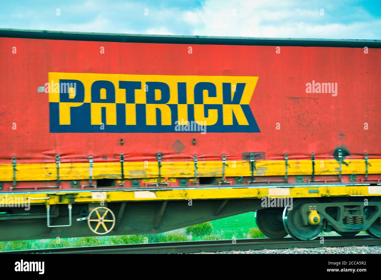 Close-up of a red Patrick container on a train in Australia Stock Photo ...