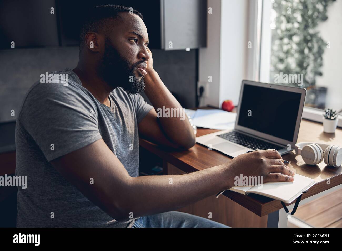 Close up of bored male person that listening to conference Stock Photo ...