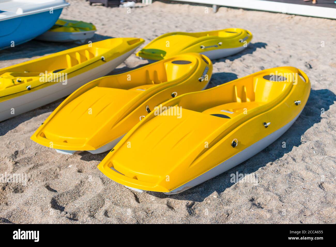 Two yellow kayaks on the beach of the island. Travel and vacation ...