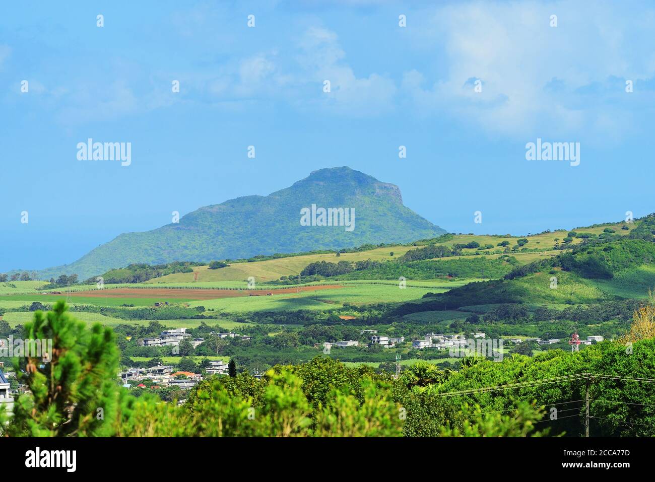Countryside landscape. Agriculture fields an mountain on background in ...