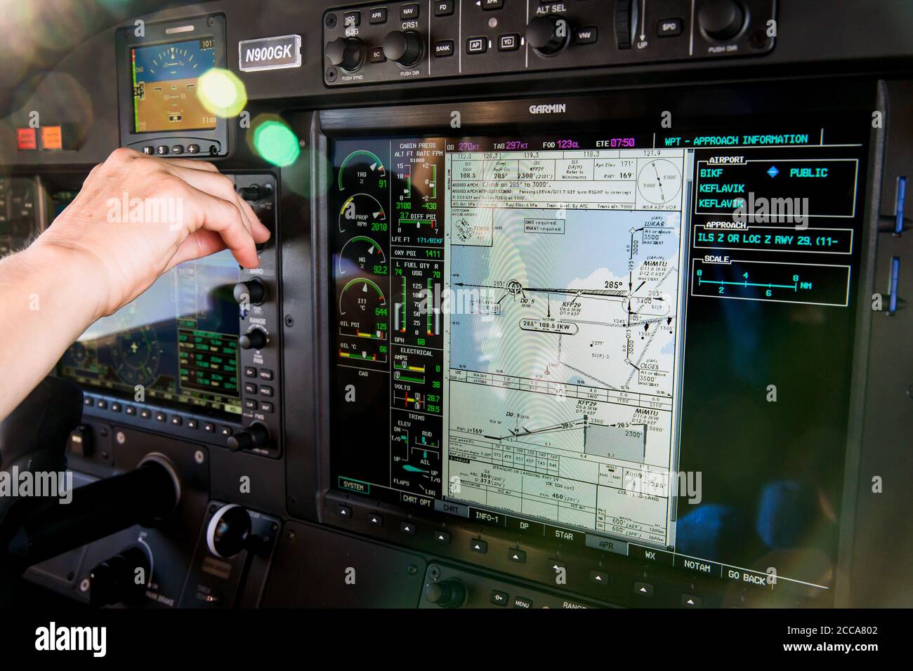 Ferry pilot Margrit Budert Walz in the cockpit of the Socata TBM 900 ...