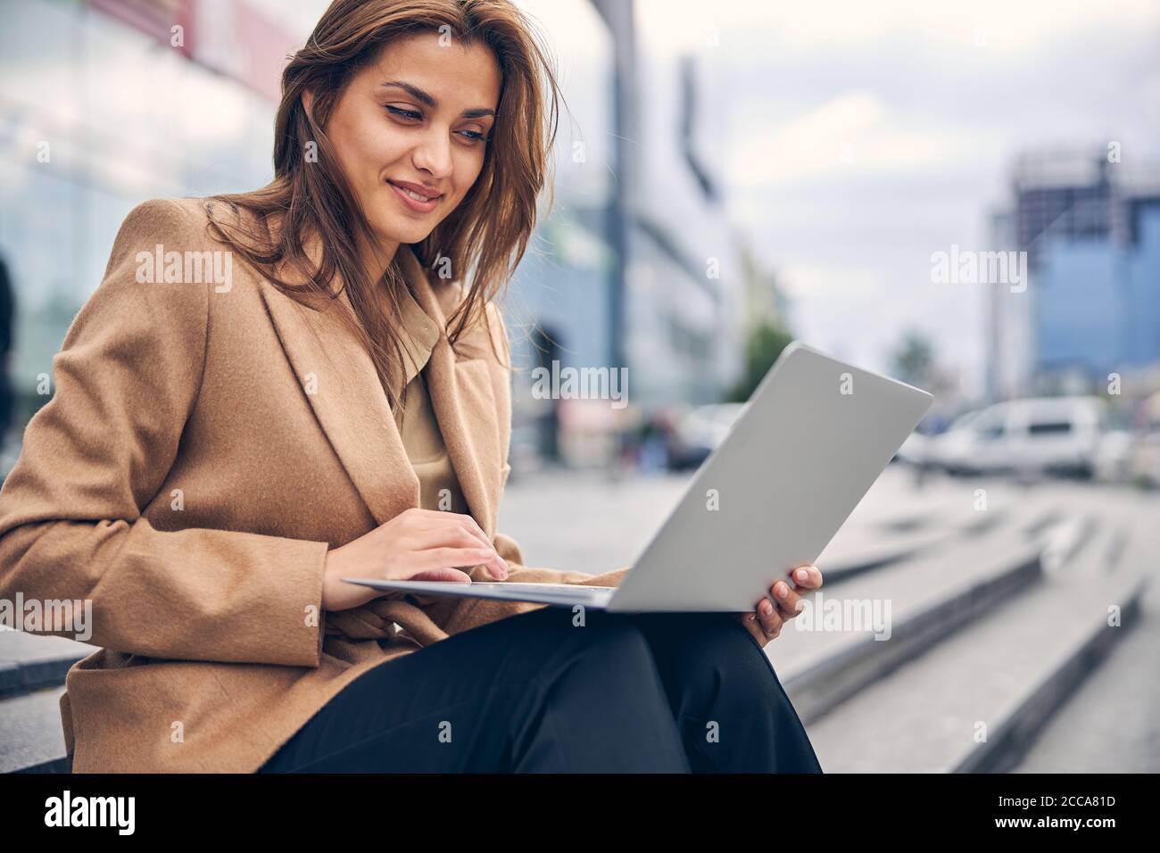 Concentrated woman staring at the laptop screen Stock Photo - Alamy