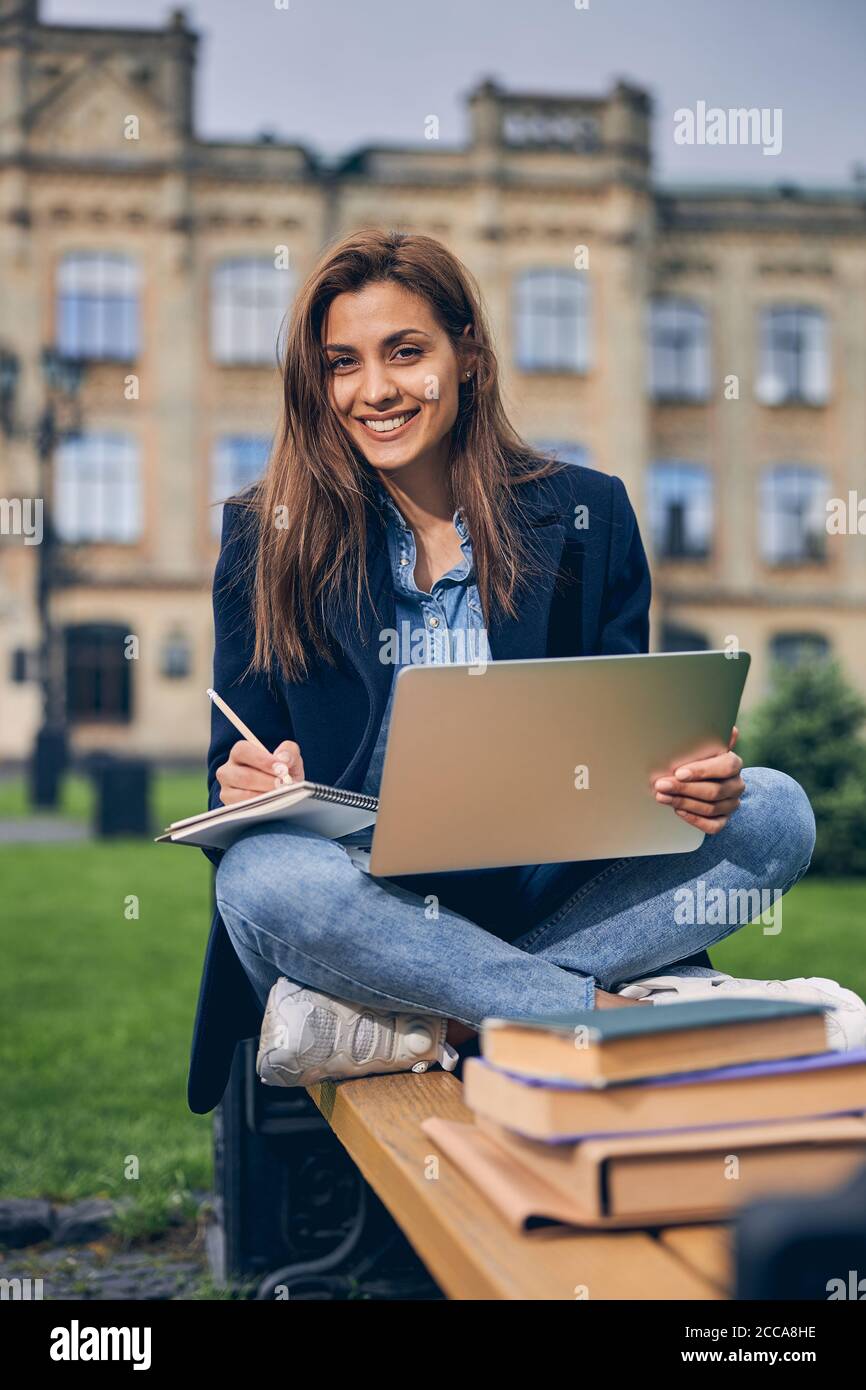 Studying alone outside hi-res stock photography and images - Alamy