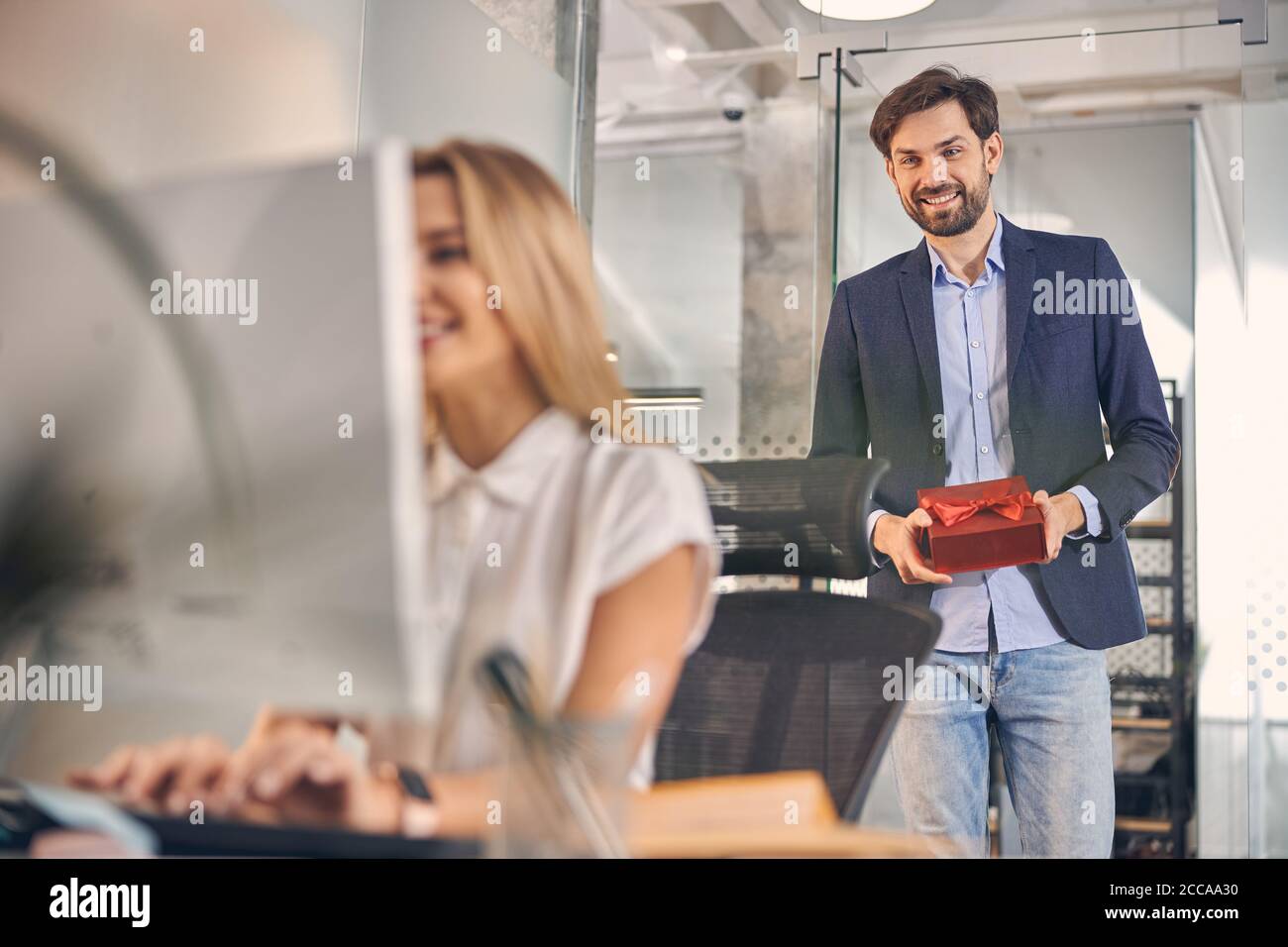 Male office surprise female colleague hi-res stock photography and ...