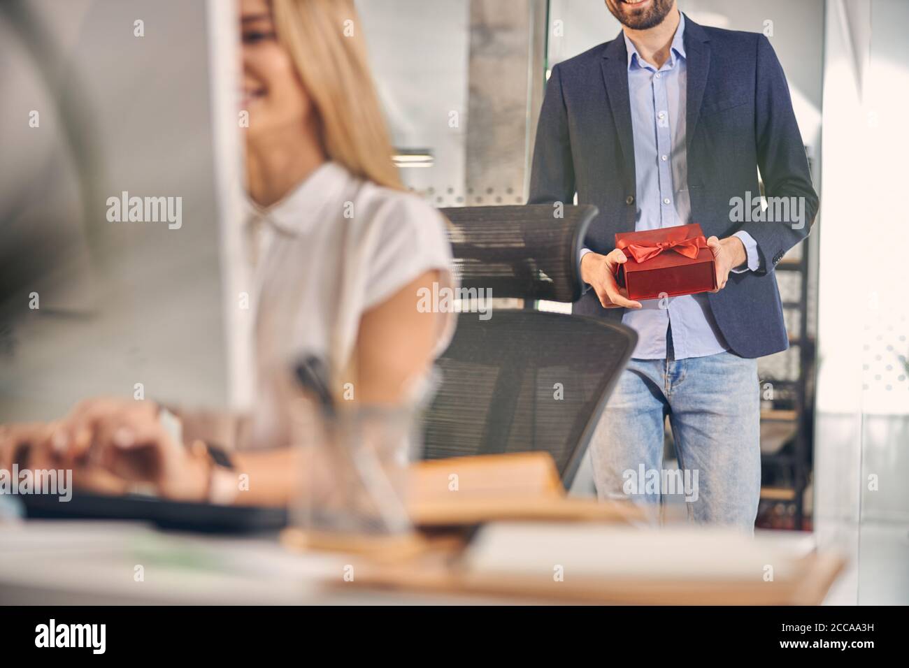 Male office surprise female colleague hi-res stock photography and ...