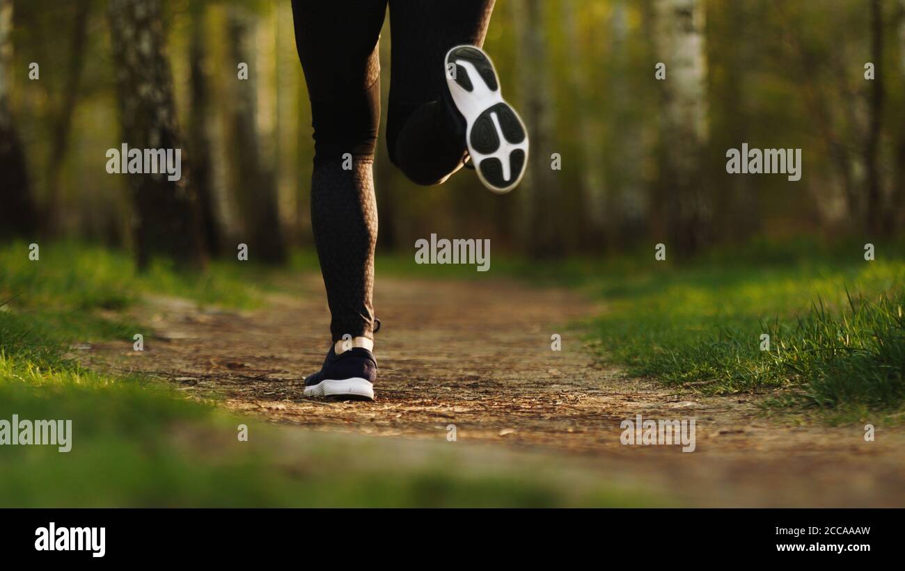 Close up feet sportswoman runner hi-res stock photography and images ...