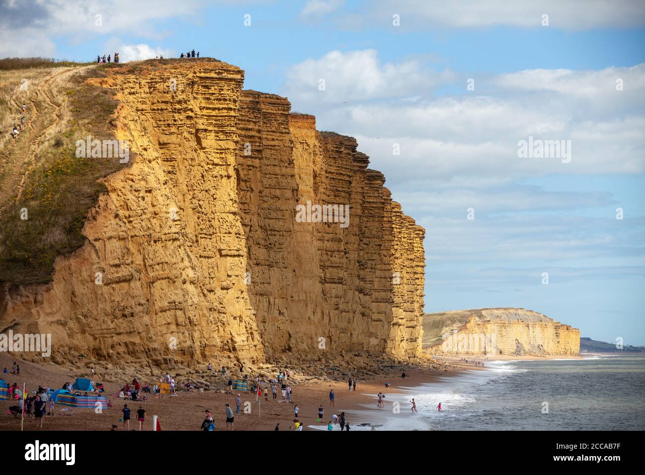 The beach and cliffs at West Bay Dorset, during summer 2020 Stock Photo ...