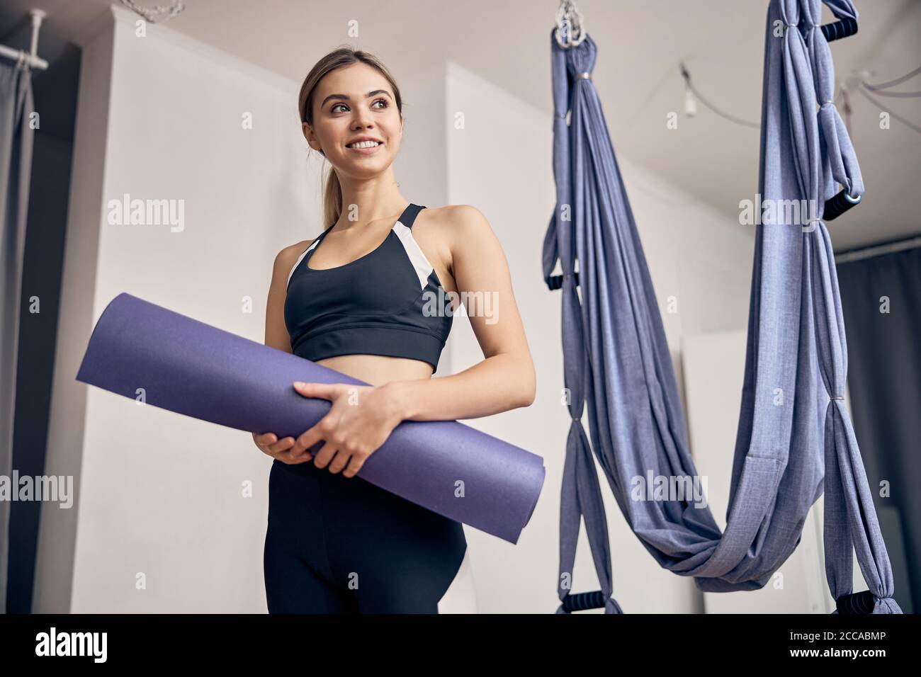 Slim young lady spending time in the gym Stock Photo - Alamy