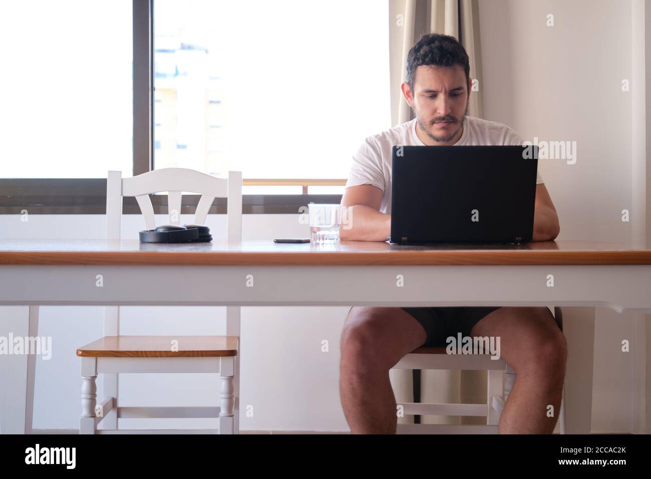 Analyzing man working home hi-res stock photography and images - Alamy