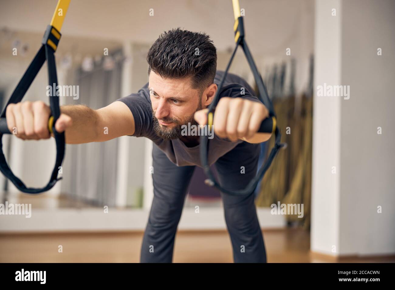 Athletic young man, lower back pain Stock Photo - Alamy