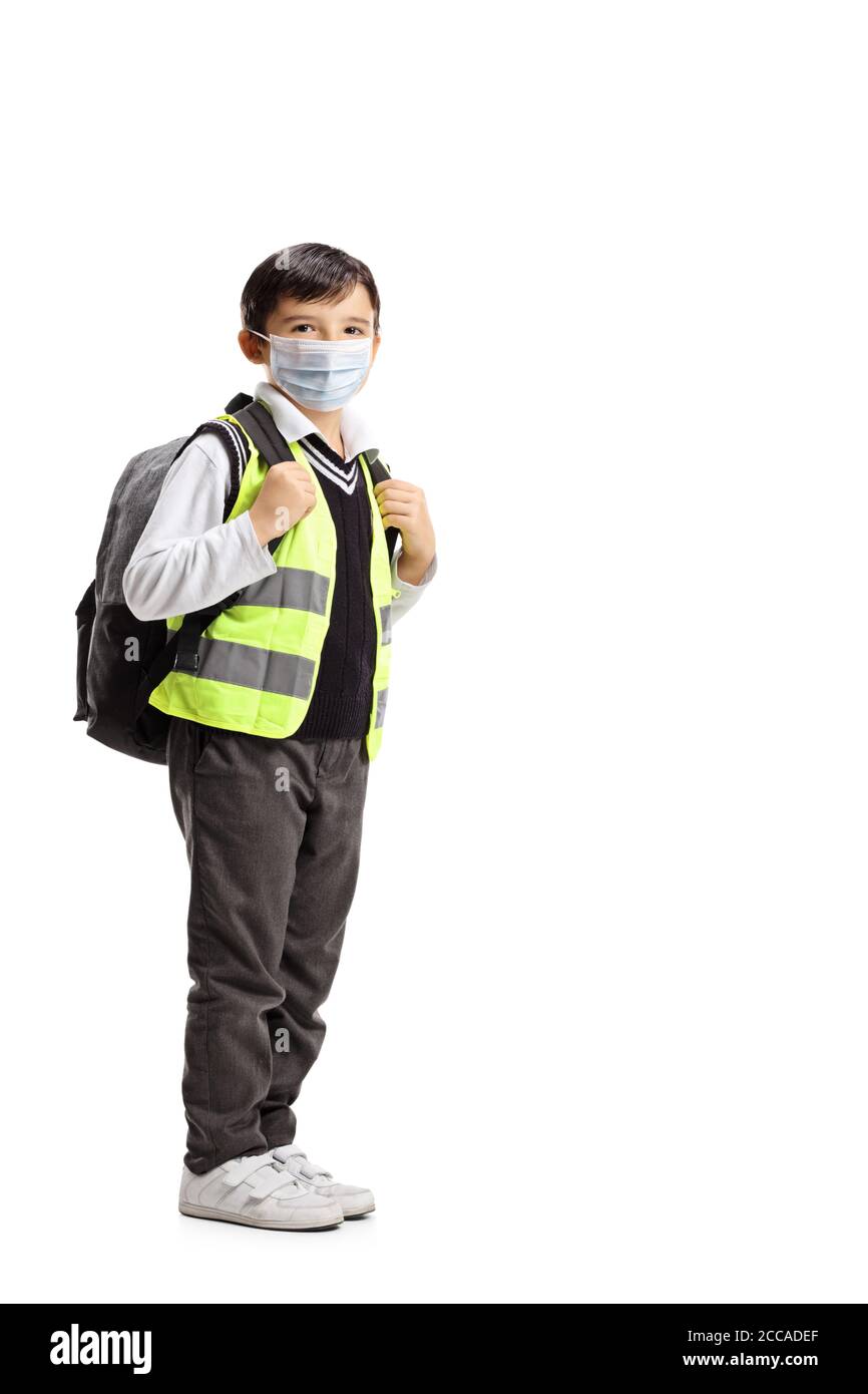 Full length shot of a schoolboy wearing safety vest and and a ...