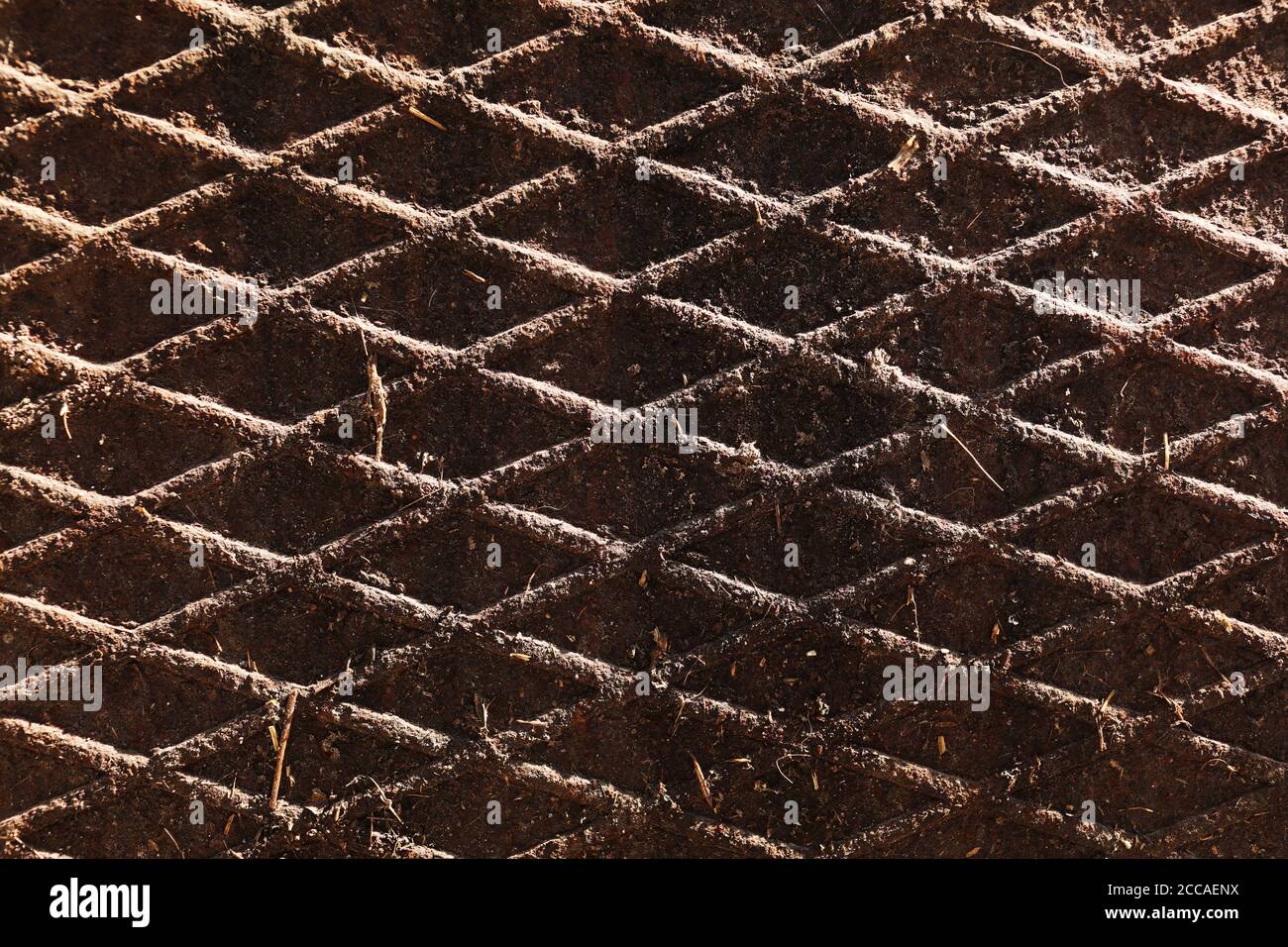 Canal cover surface texture. Rusty iron square pattern. Rusty metal ...