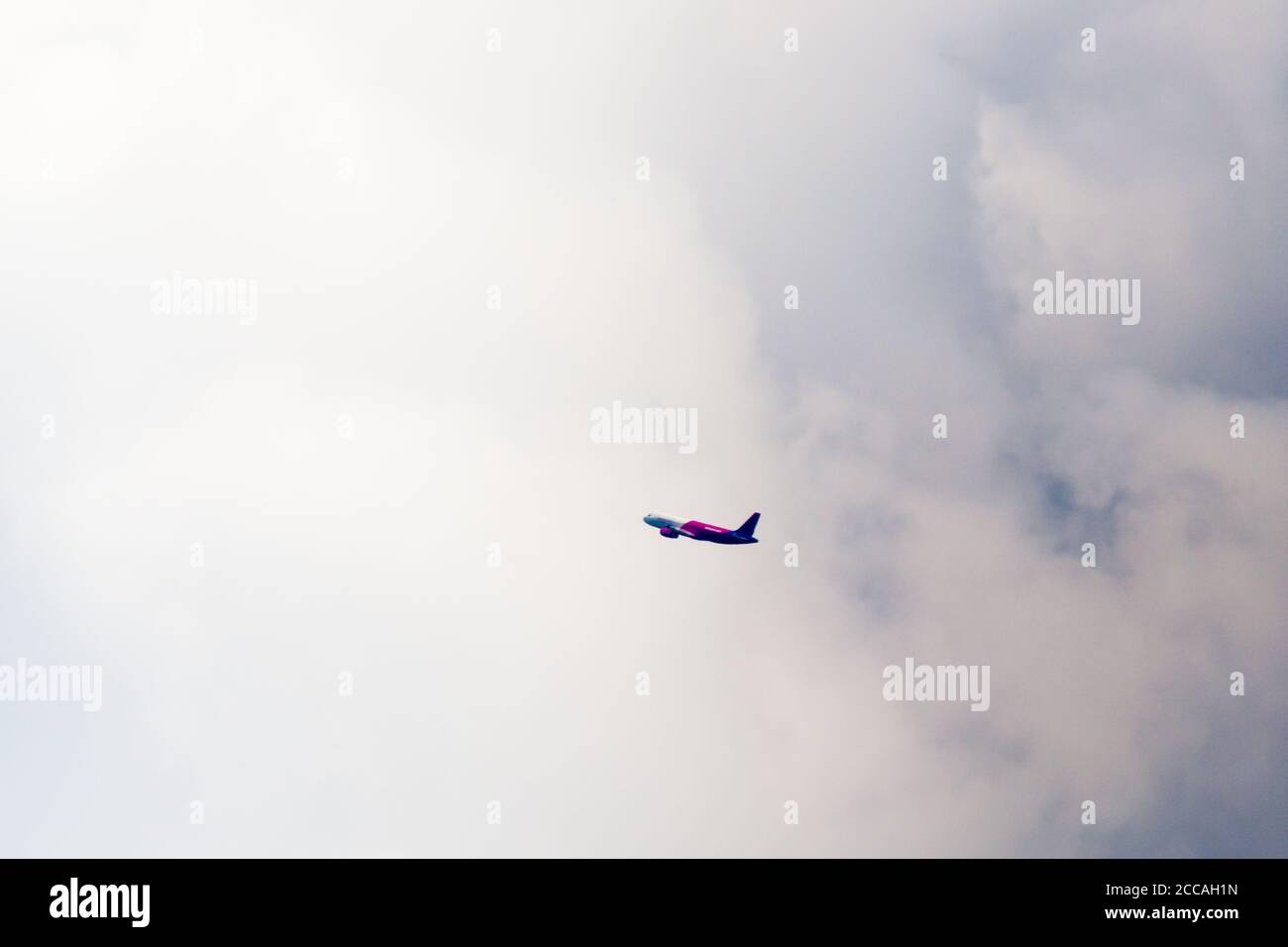 air plane escaping from a storm Stock Photo - Alamy