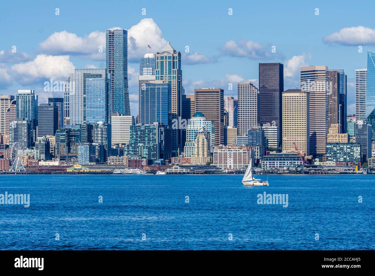 A view of the Seattle waterfront and a sailboat Stock Photo - Alamy