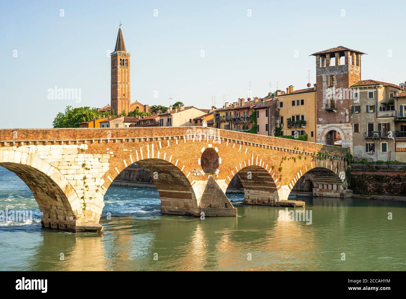The Roman Ponte Pietra stone arch bridge over the river Adige in the ...