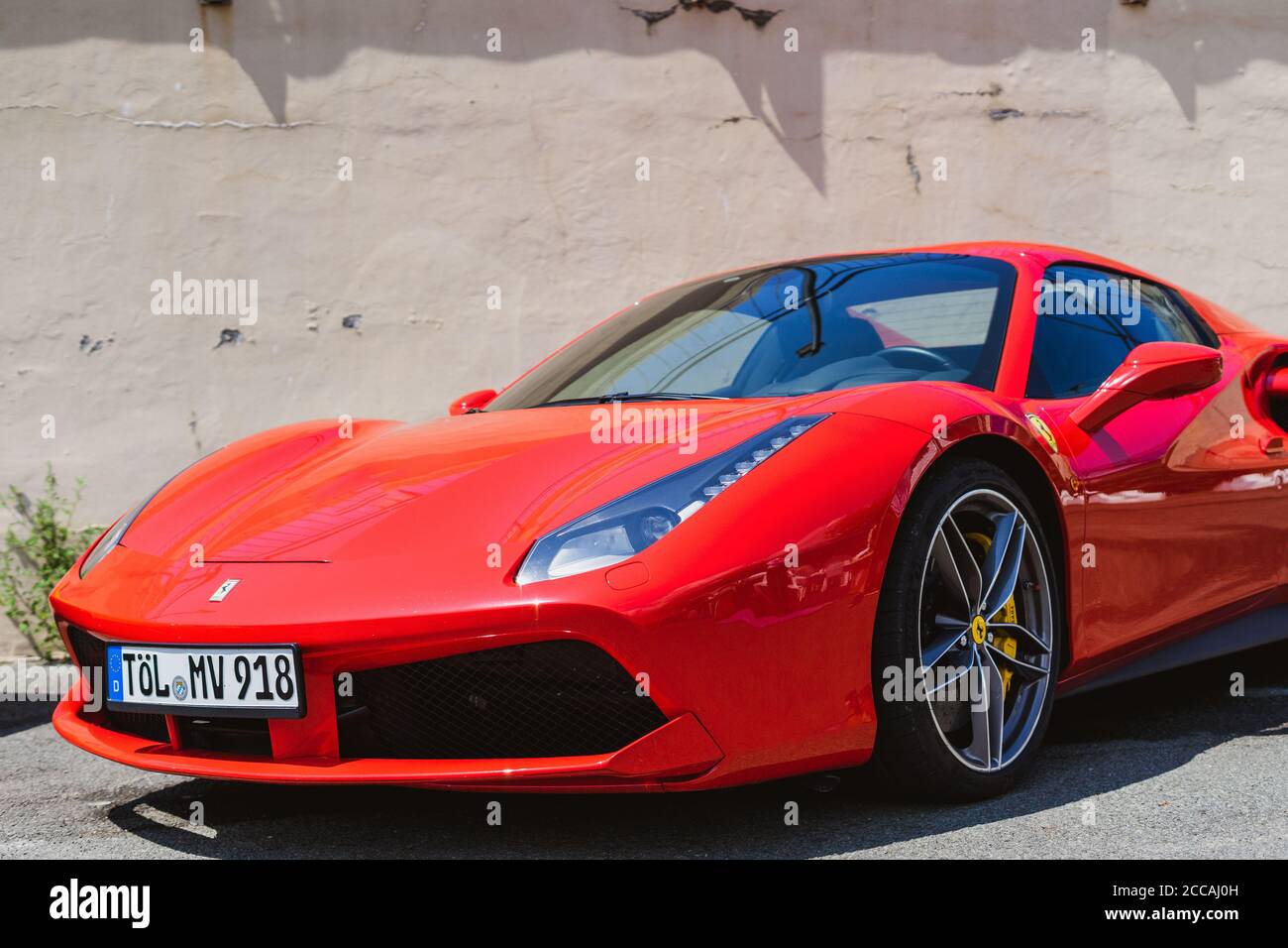 SESTRI LEVANTE, ITALY - Jul 18, 2020: Shiny red Ferrari parked on ...