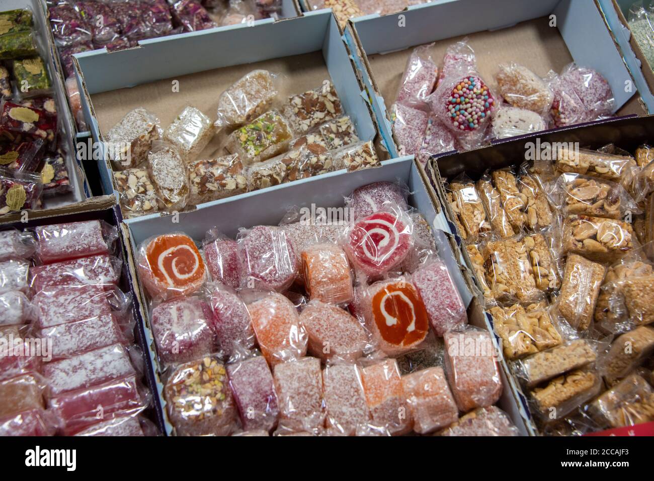Israel, Jerusalem, Old City, Via Dolorosa. Typical candy vendor stand ...