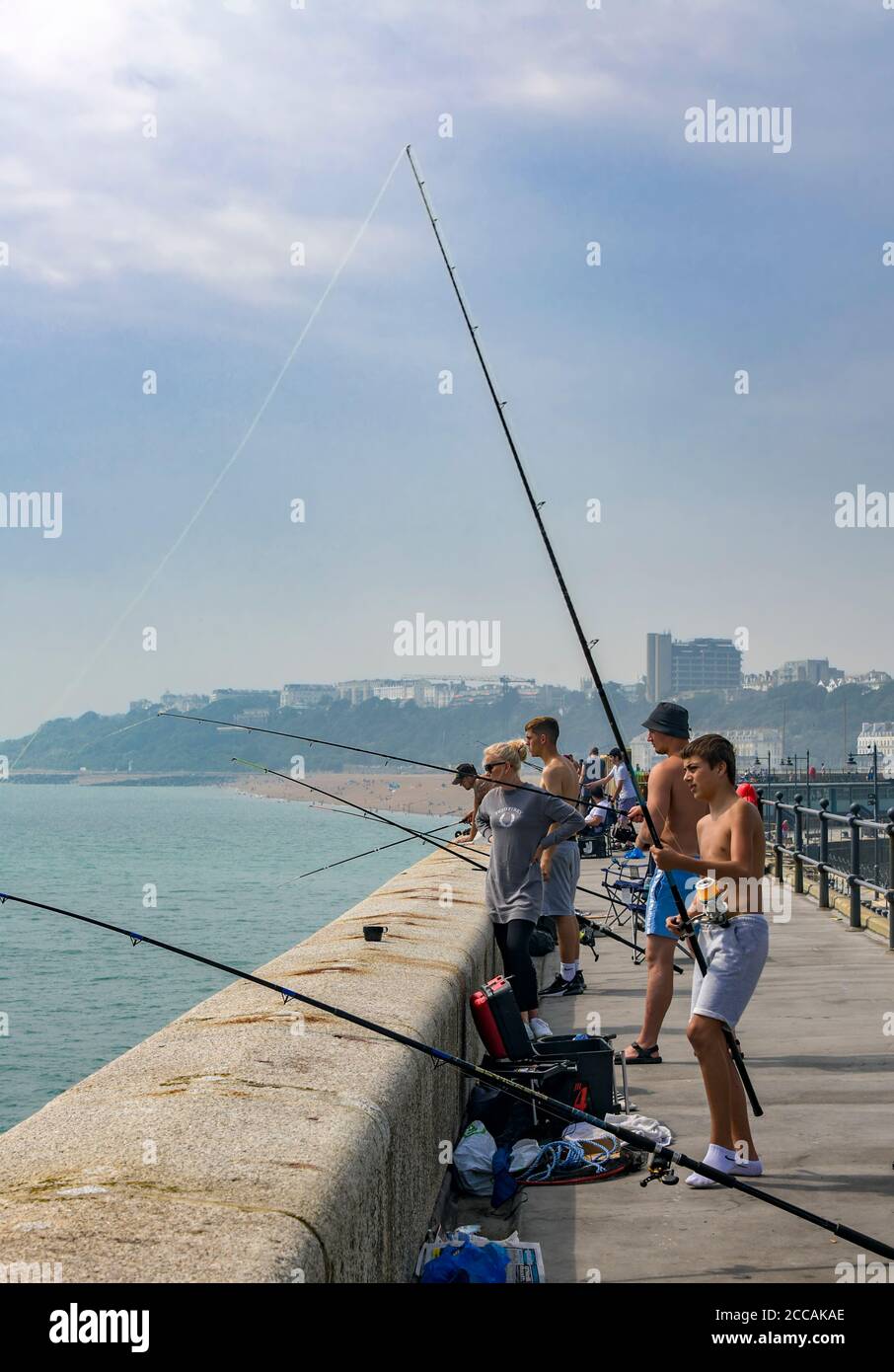 People fishing Folkestone Pier Kent England Stock Photo - Alamy