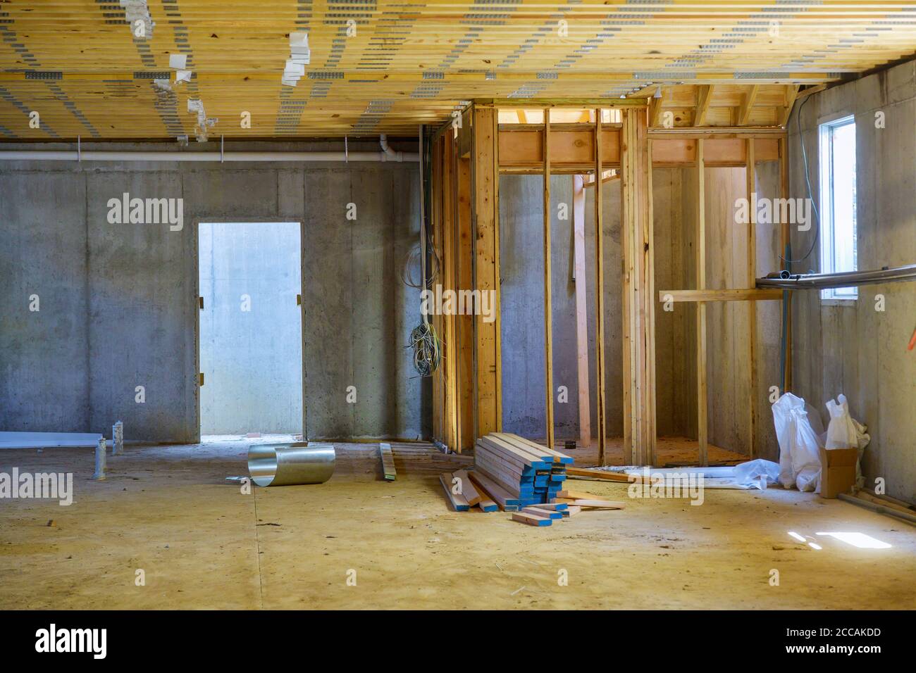 New residential construction home framing with basement unfinished view ...