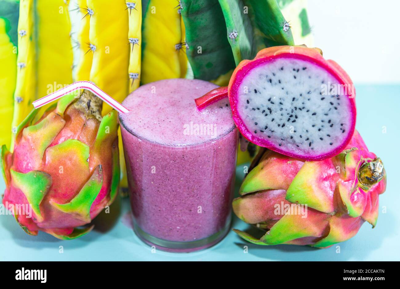 Pitaya juice (Hylocereus polyrhizus). Pink and flaky fruit. Energy and ...