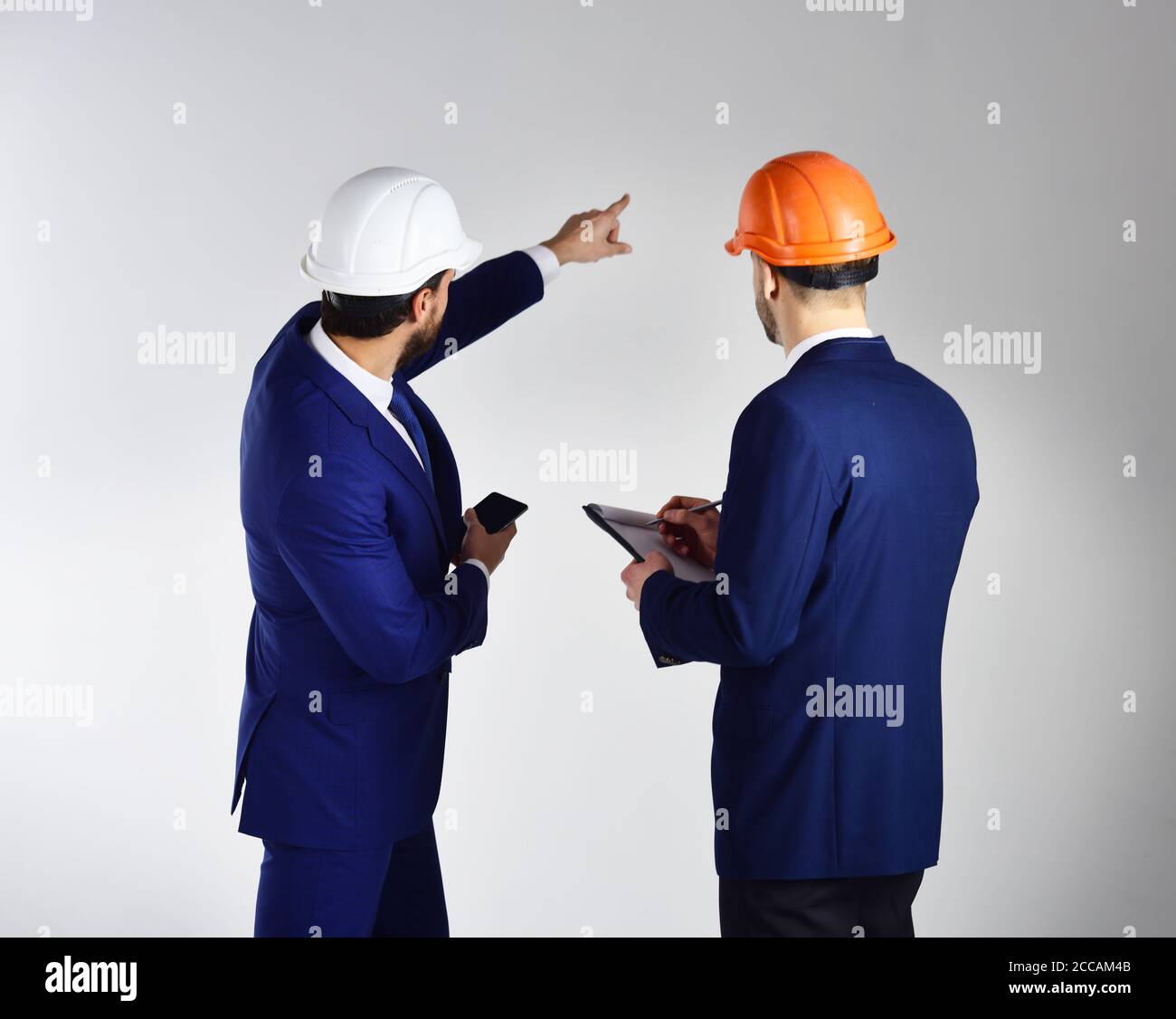 Man pointing something with his finger. Main engineer and building ...