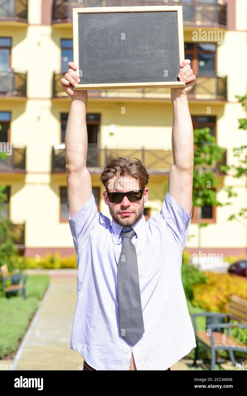 Salesman with advertise for sale. Business and real estate concept ...