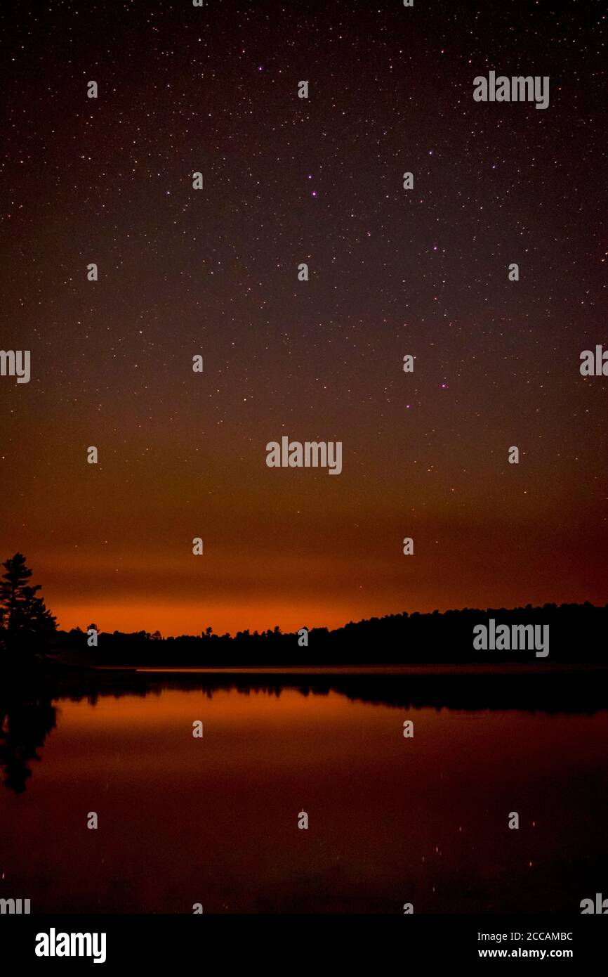 Stars over lake Stock Photo - Alamy