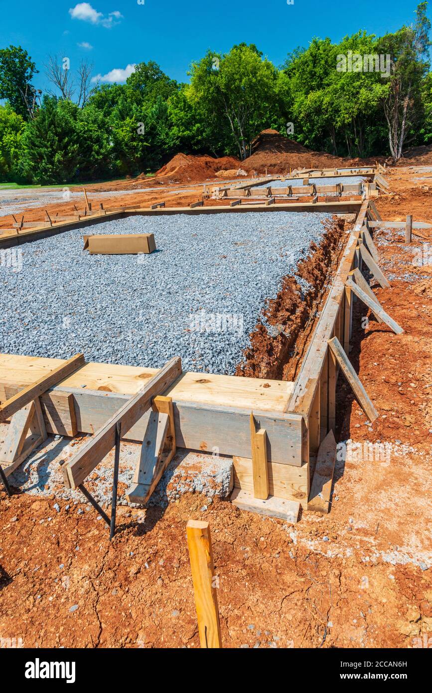 Vertical shot of wooden framework for a concrete slab to be poured for ...