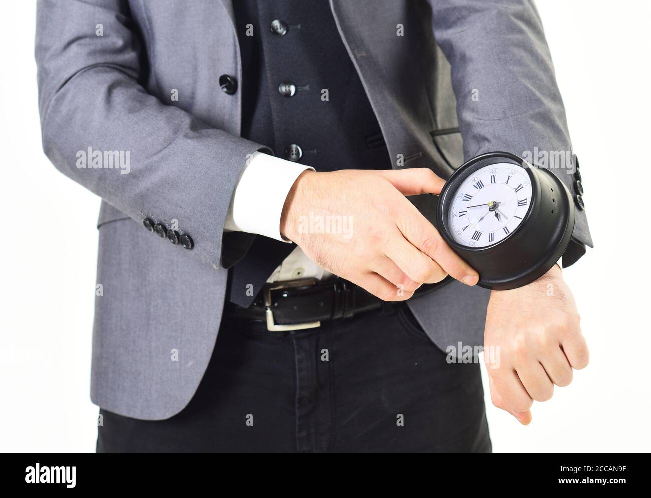 Hand with old watch showing time on white background Stock Photo - Alamy