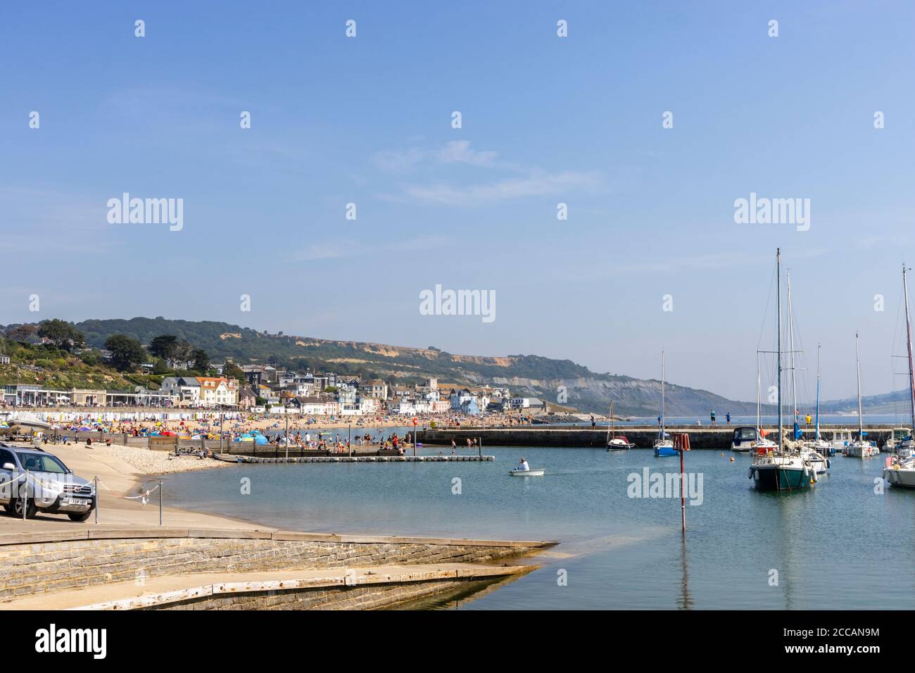 View from the Cobb of the beach and waterfront at Lyme Regis, a popular ...