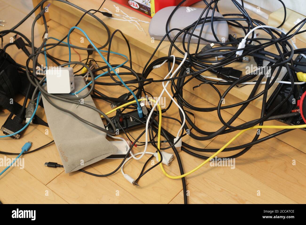 Mess of Electronic Charging Equipment and Cables Stock Photo - Alamy