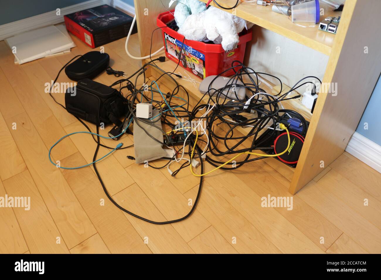Mess of Electronic Charging Equipment and Cables Stock Photo - Alamy