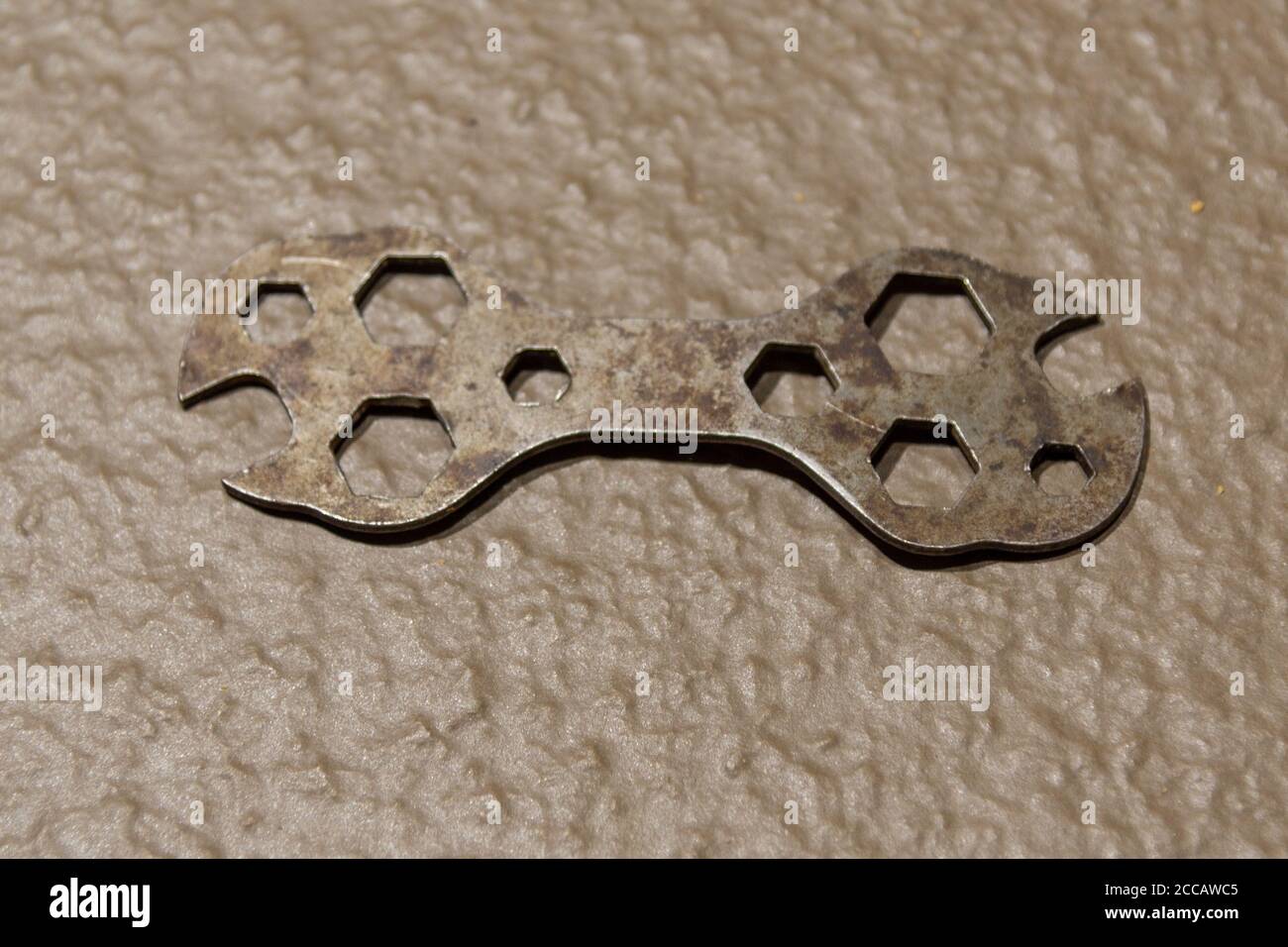 Multi-function spanner. Hinged Spanner. It guarantees speed and ...