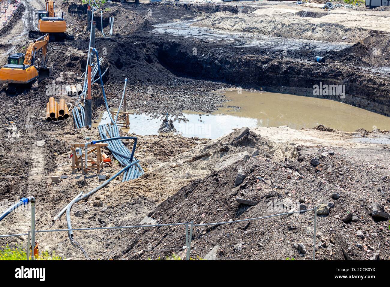 Groundwater in excavation pit, dewatering in construction Stock Photo ...
