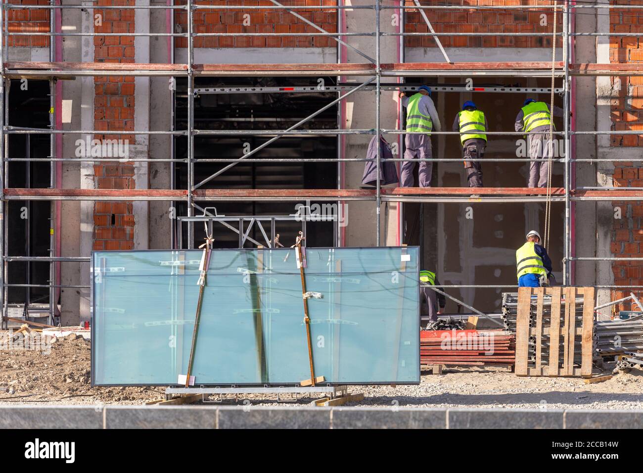 Large glass ready for build in. Glass facade installation Stock Photo ...