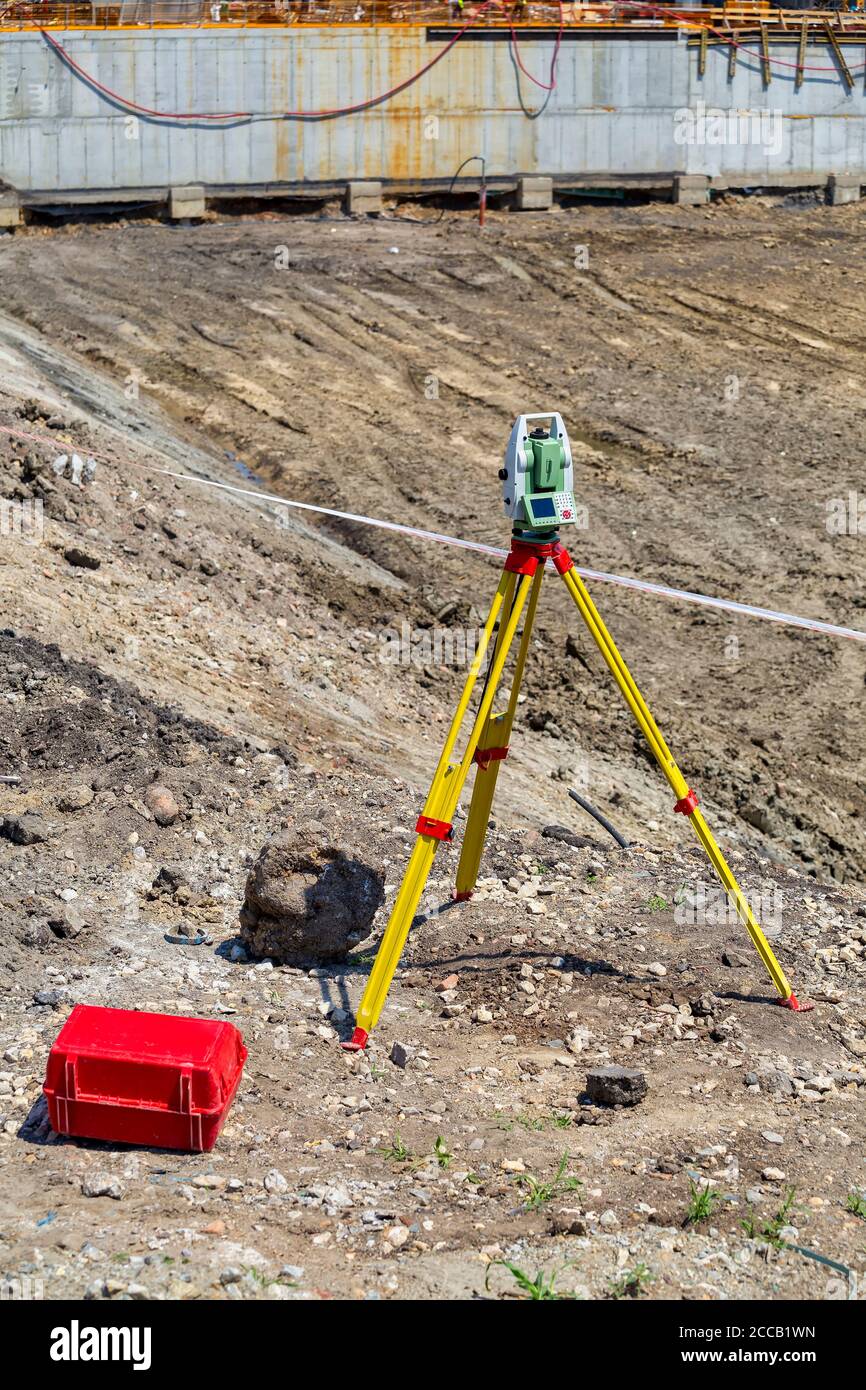 Surveyor equipment total station outdoors at construction site ...