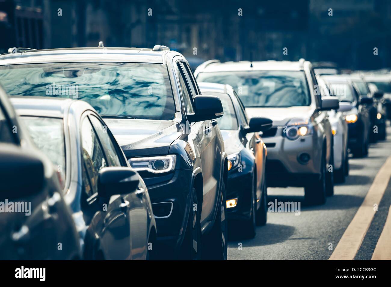 Cars standing in a line during traffic jam Stock Photo - Alamy