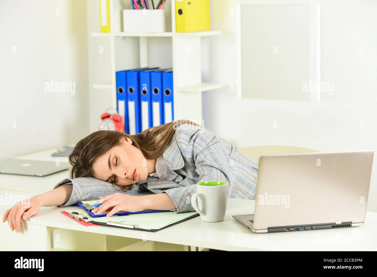 Energy and tiredness. Girl fell asleep on table. Pretty woman sleep at ...