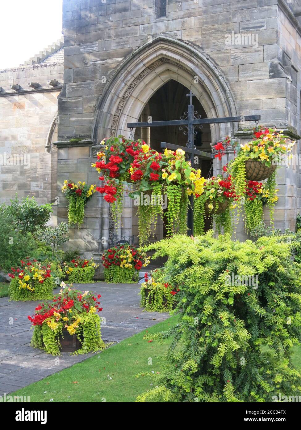 A summer planting scheme of red and yellow for the beautiful hanging ...