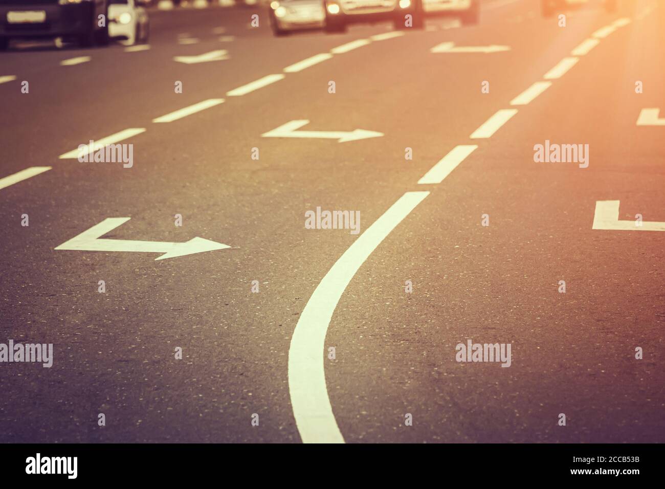 Right arrows on the asphalt of the highway Stock Photo - Alamy