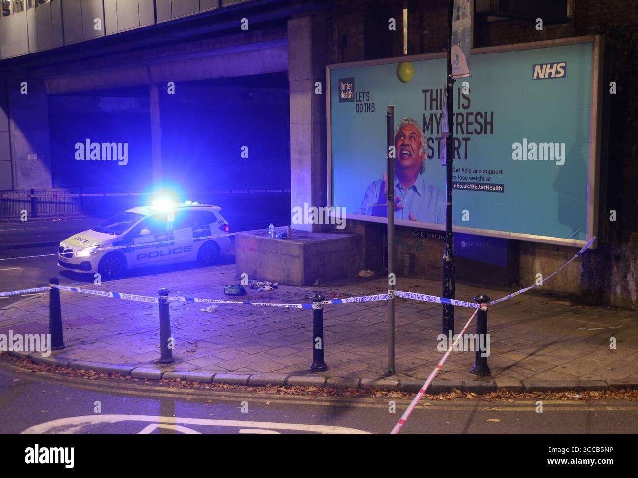 A police cordon at the scene of a stabbing outside Westferry DLR ...