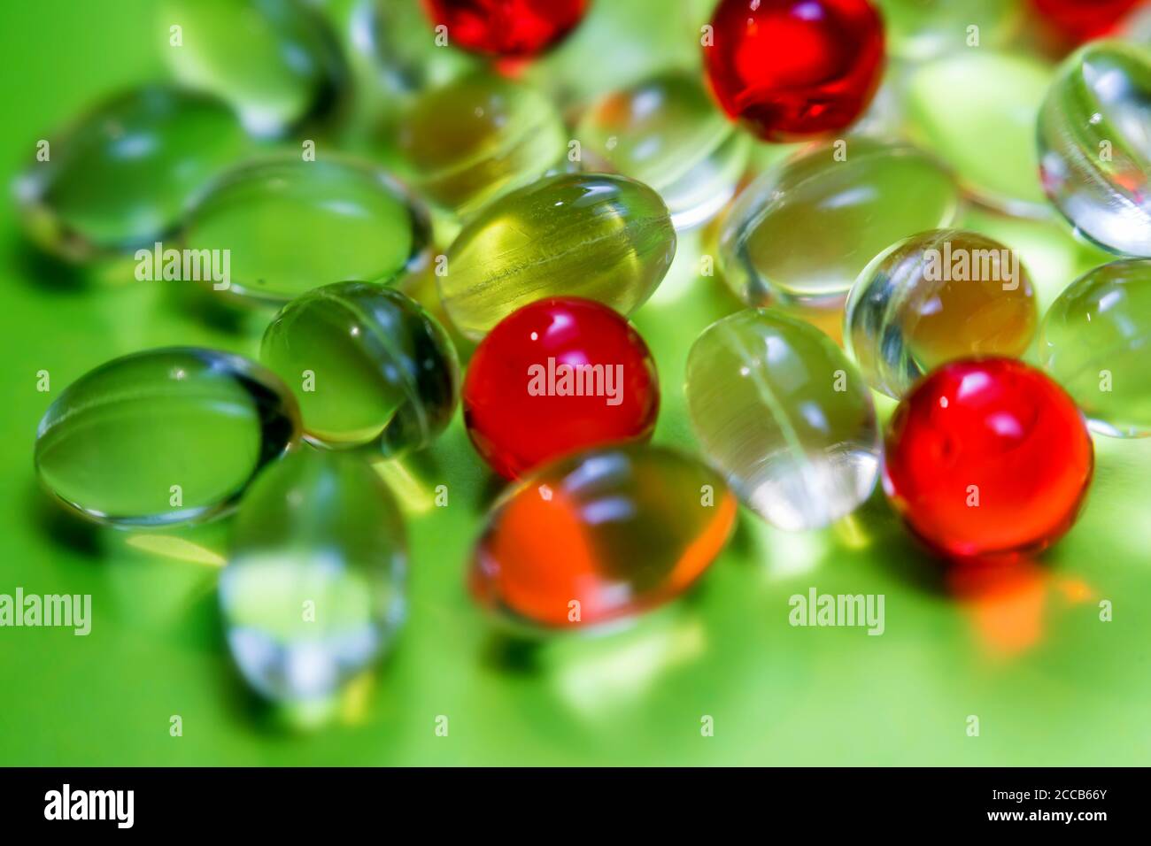 Healthcare medication pharmacy on vivid green background Stock Photo ...