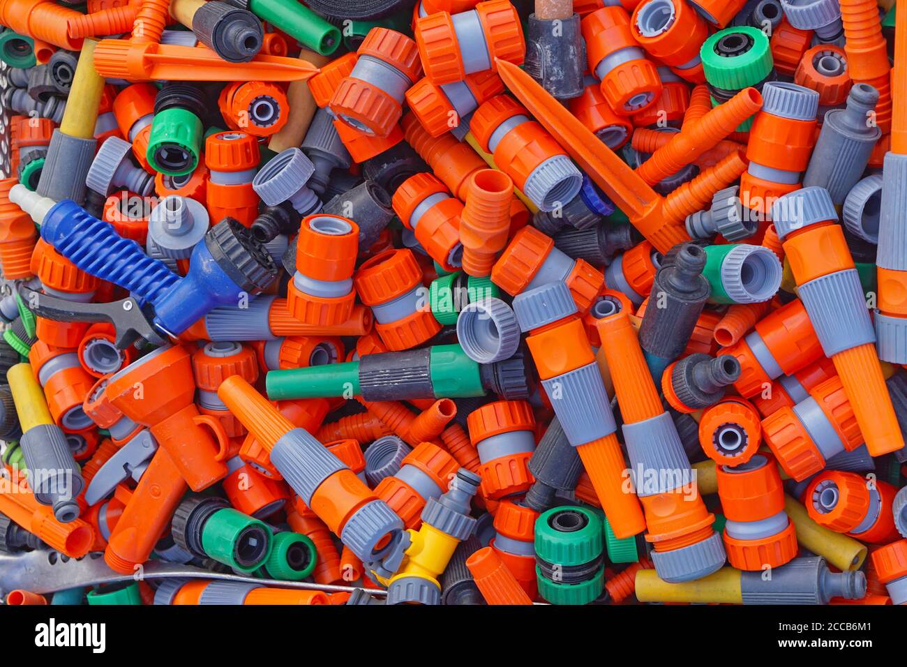 Colorful plastic valves parts for water hoses Stock Photo - Alamy